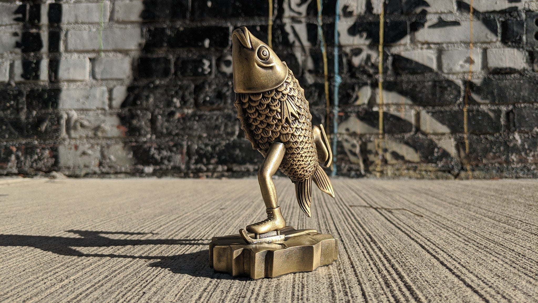 Jim Pollock "Skating Fish" Antique Bronze Variant – Bottleneck Gallery