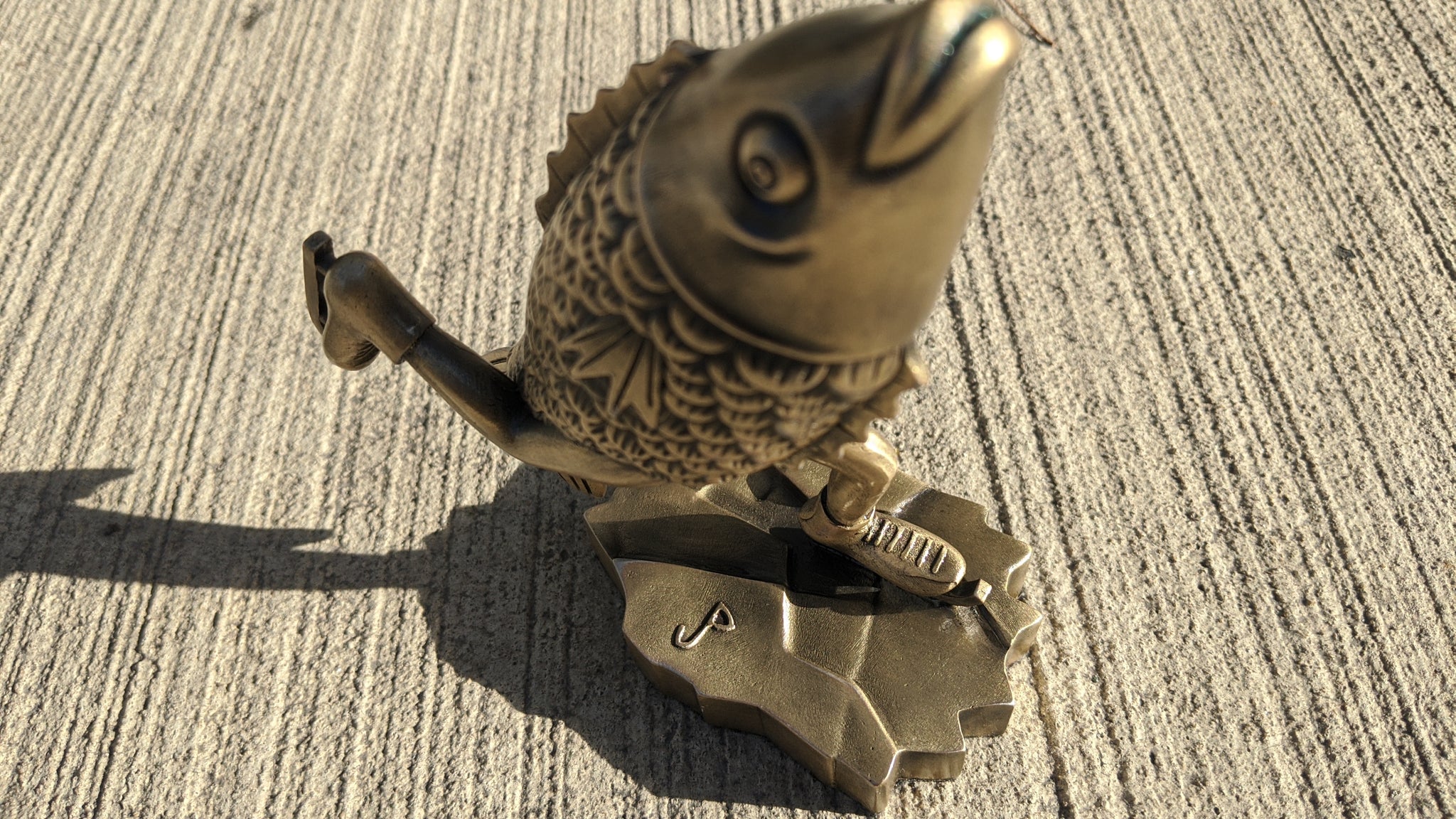 Jim Pollock "Skating Fish" Antique Bronze Variant – Bottleneck Gallery