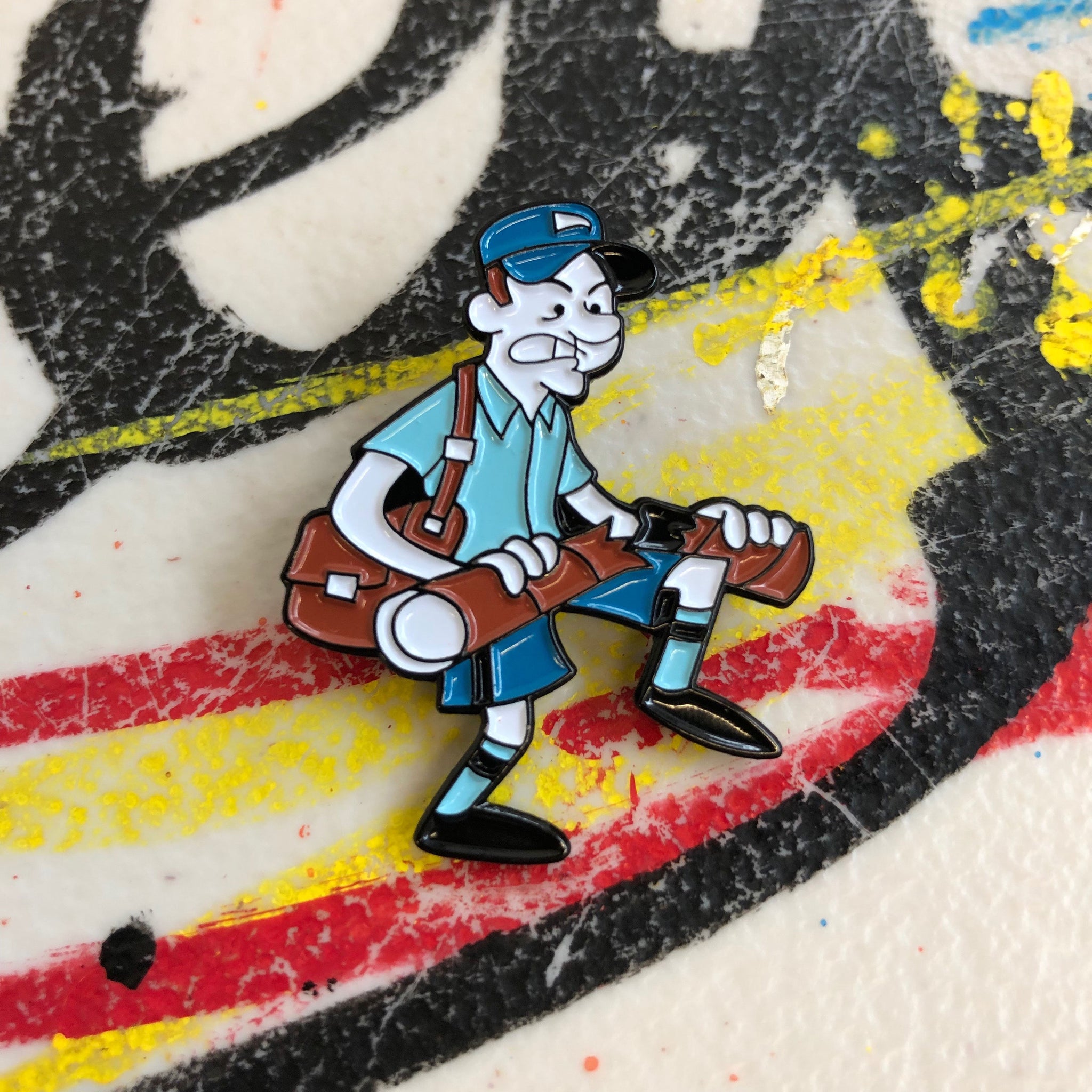 Ian Glaubinger “Angry Mailman” Enamel Pin – Bottleneck Gallery
